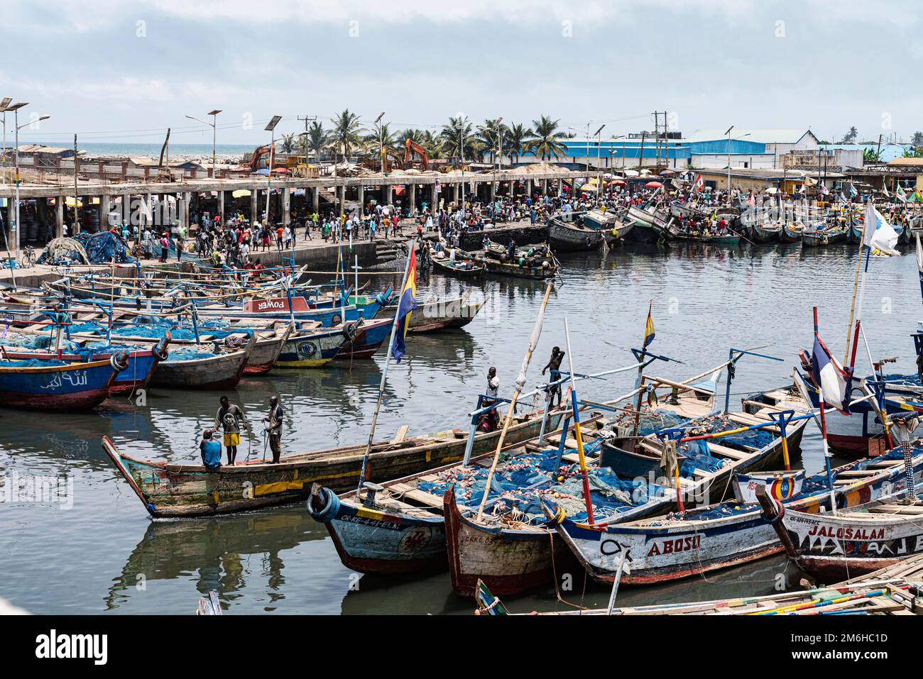 Colourful traditional fishing boats, Elmina fishing port, Gold Coast ...