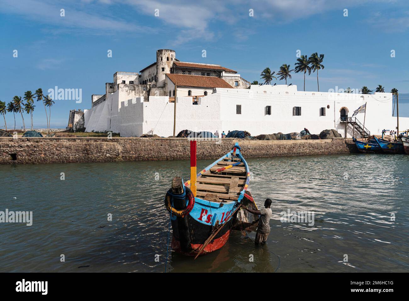 Fishing boat, pirogue, back Elmina Castle, St. George's Castle ...
