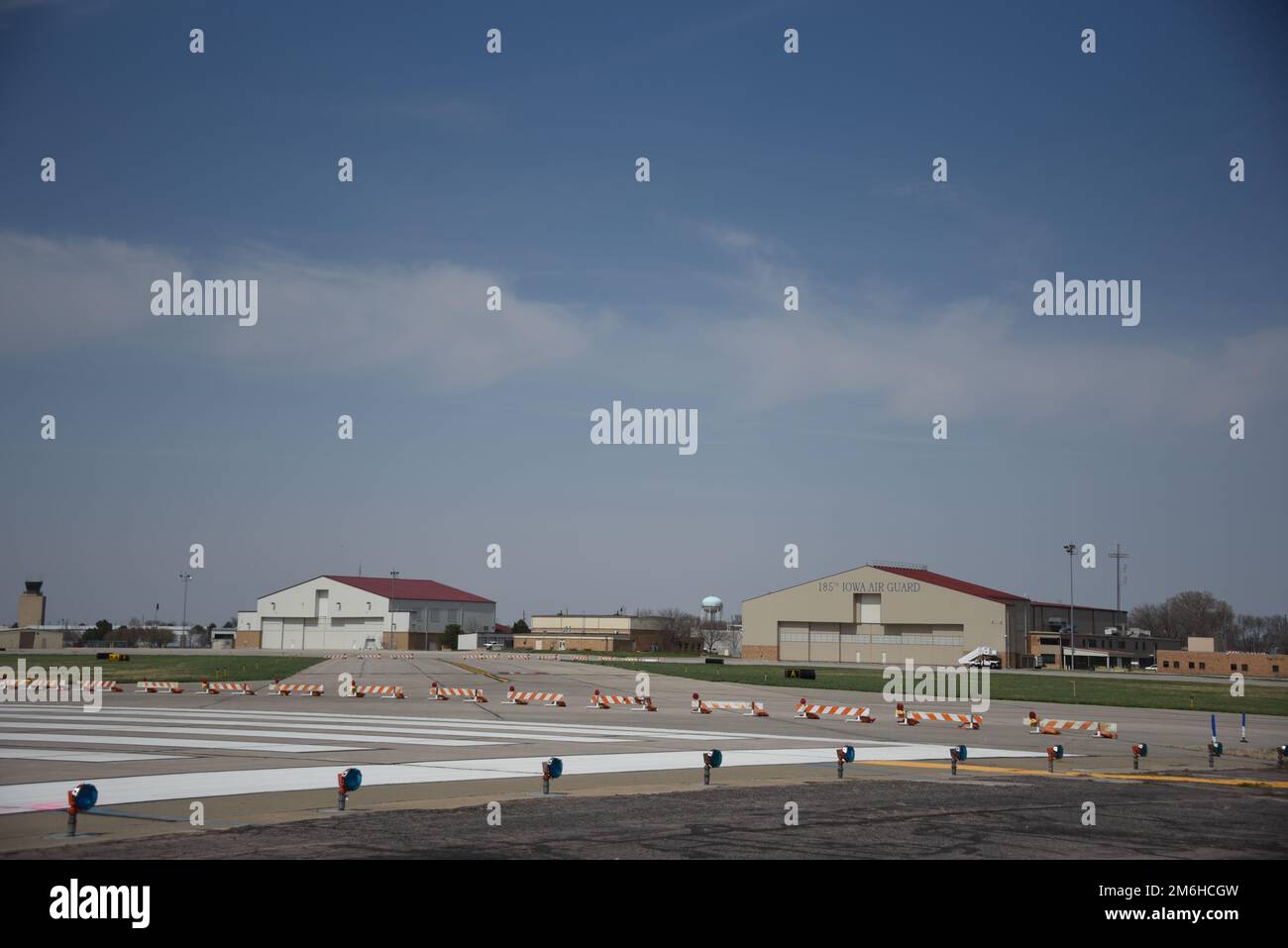 The flight line sits empty as construction begins on runway 13-31 at ...