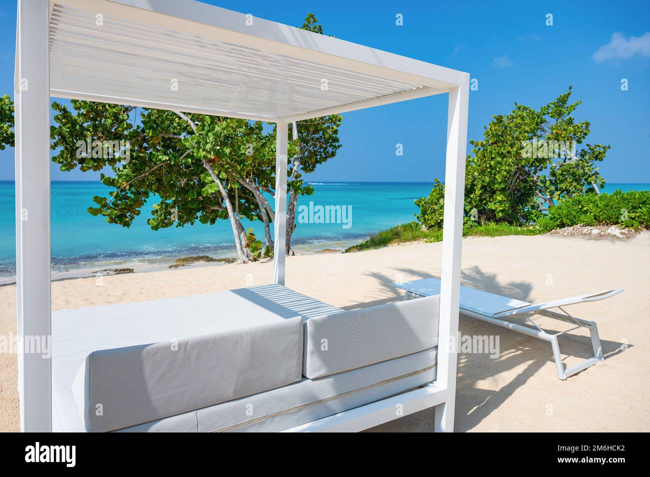 White bed on the sandy beach of the sea Stock Photo - Alamy