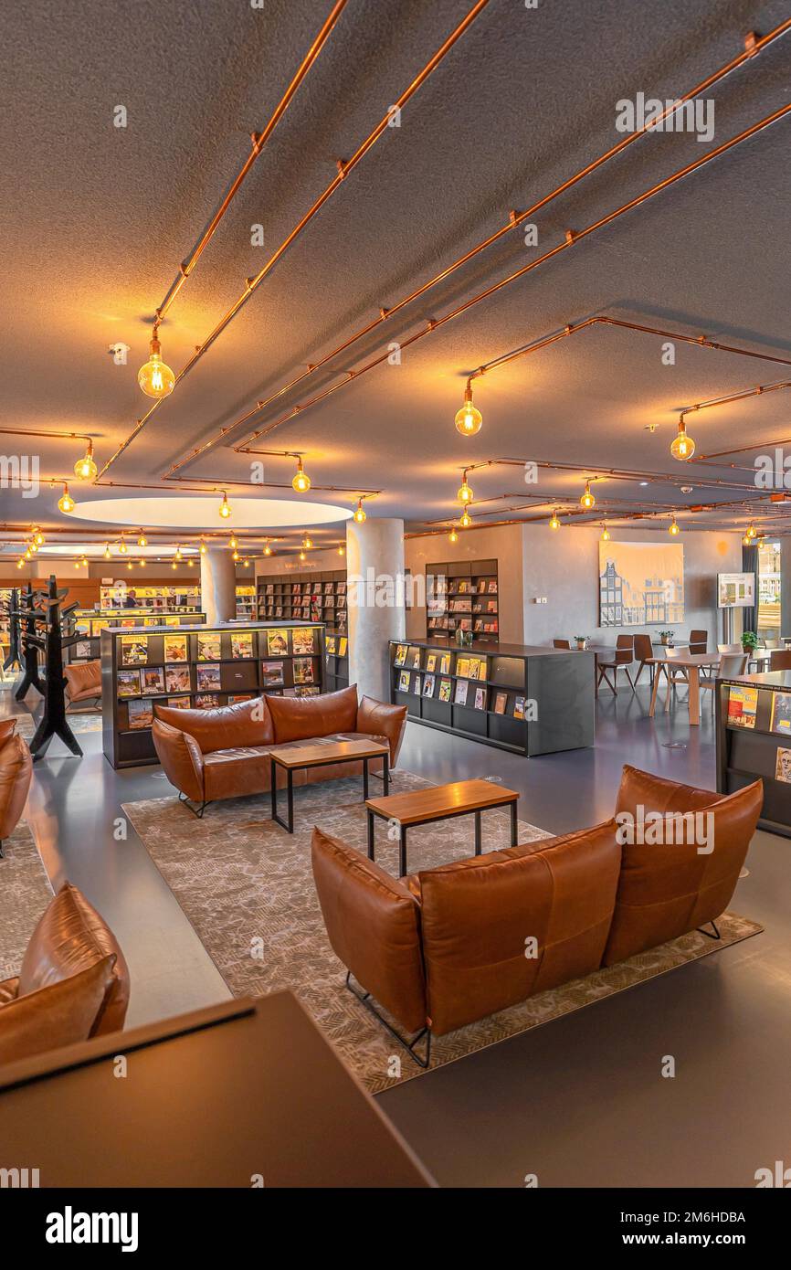 Sofas in relaxed library location, Amsterdam, Netherlands Stock Photo ...