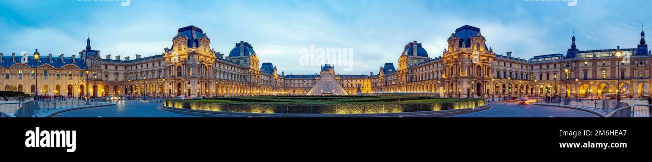 Louvre illuminated Panorama Paris France Stock Photo - Alamy