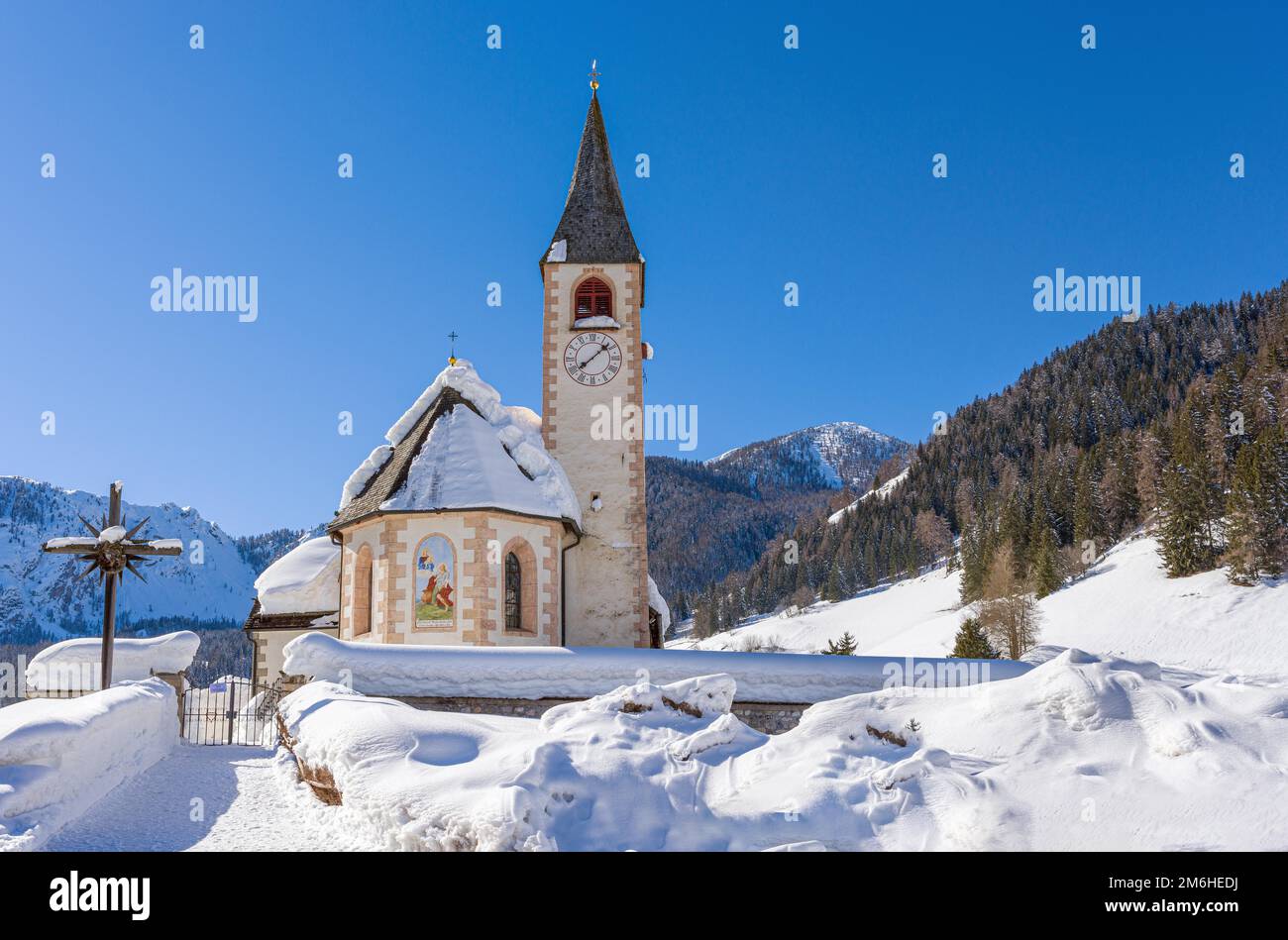 Snow-covered church in the Fanes Sennes Braies nature park Park, San ...