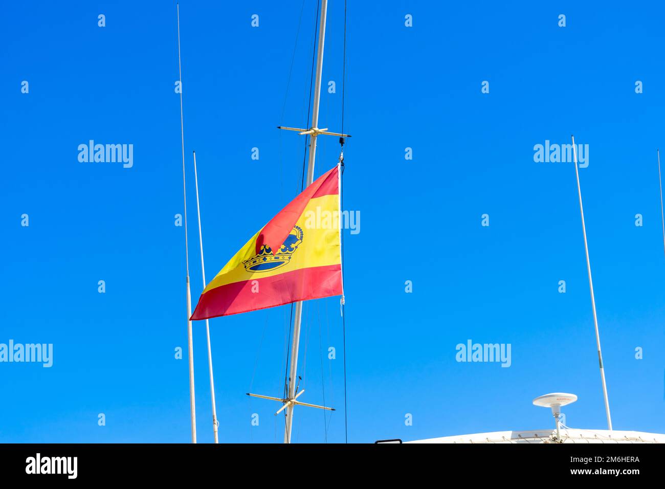 Spanish flag on yacht, Costa del Sol, Spain Stock Photo - Alamy