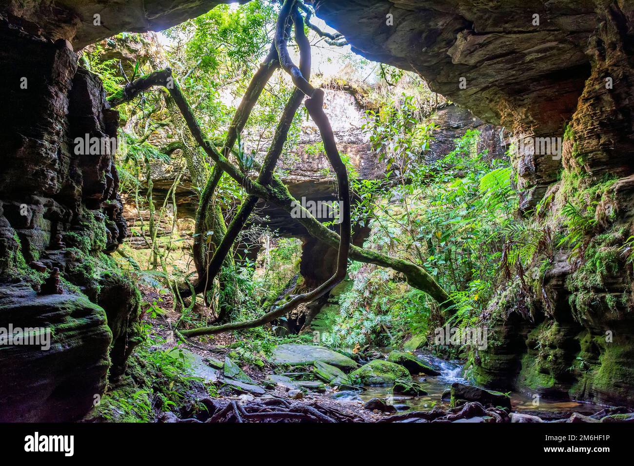 River running through stone cave in Carrancas Stock Photo - Alamy