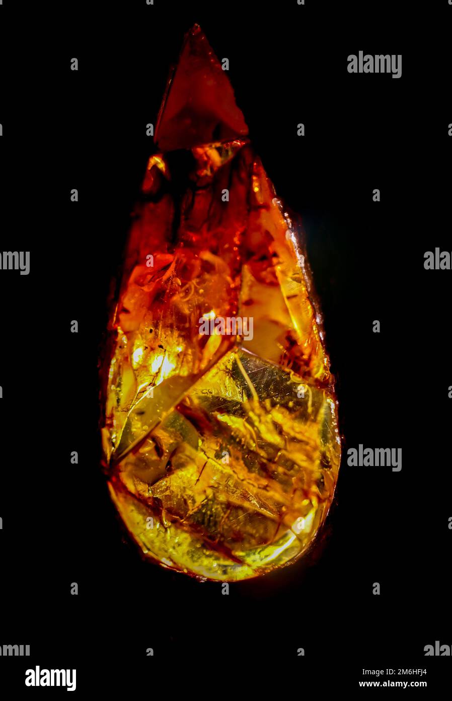 Amber in its natural form and warm color. Amber is often made into ...