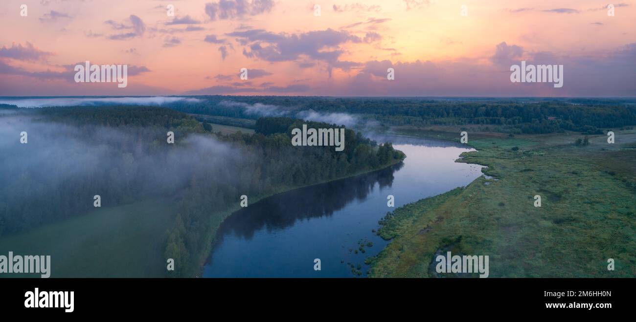Aerial panoramic landscape with sunset over the river with islands and ...