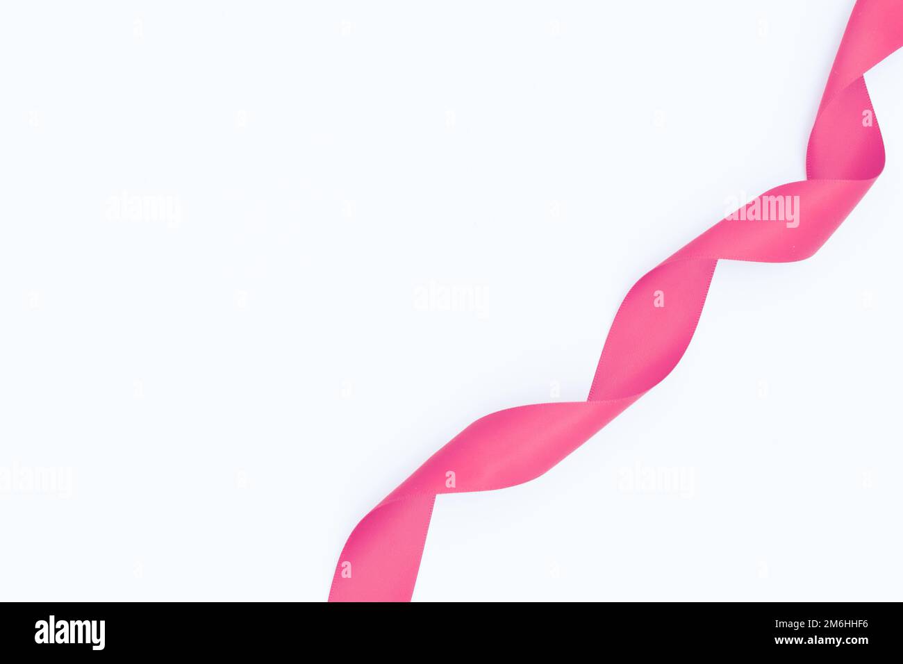 Pink gift wrap satin ribbon, isolated on white background. Background ...