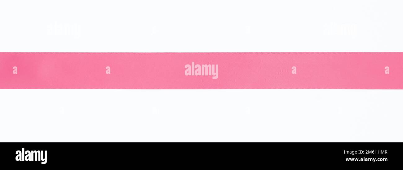 Pink gift wrap satin ribbon, isolated on white background. Background ...