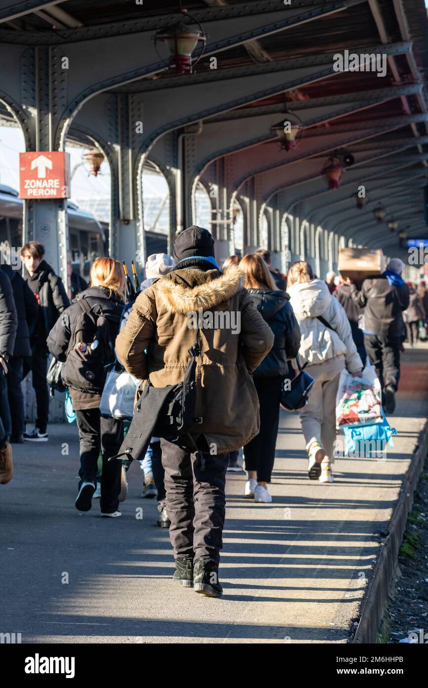 People getting on and off the train at Bucharest North Railway Station ...