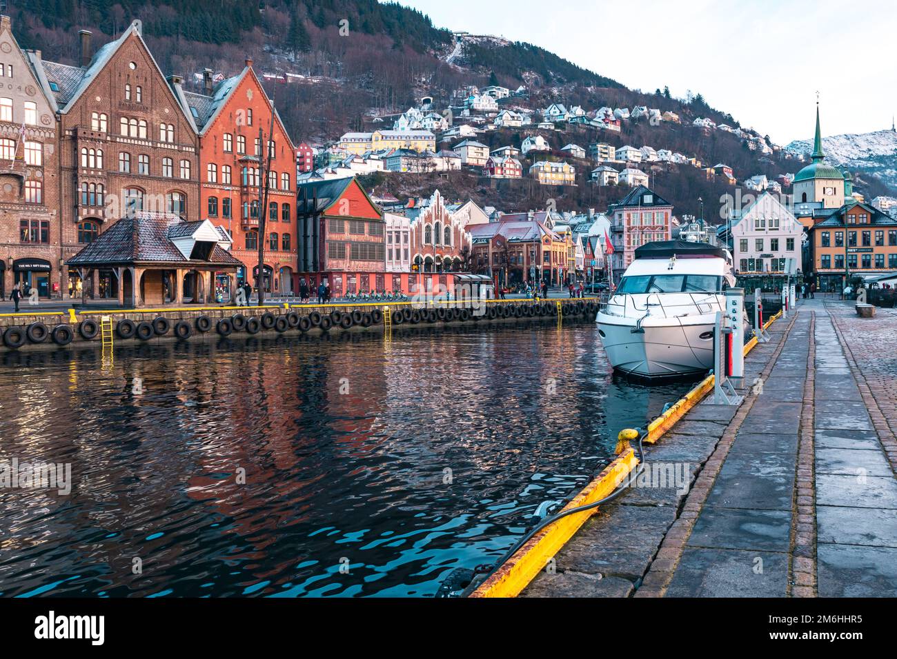 Famous Bryggen street with historical wooden colored houses. Hanseatic ...