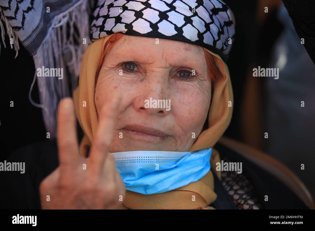 Palestinians attend a rally marking the 58th anniversary of the Fatah ...