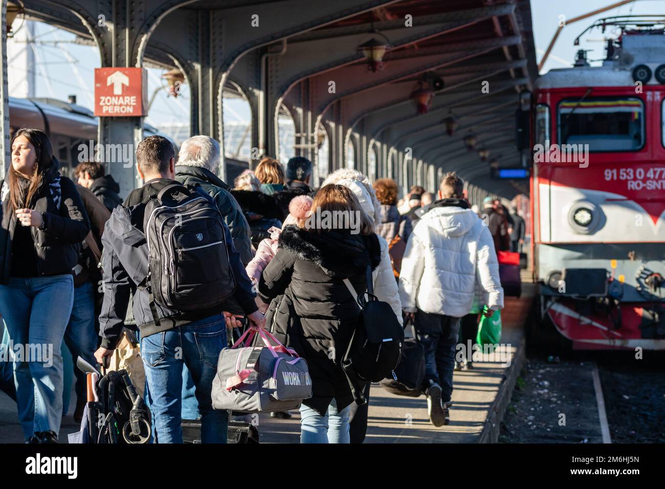 People getting on and off the train at Bucharest North Railway Station ...