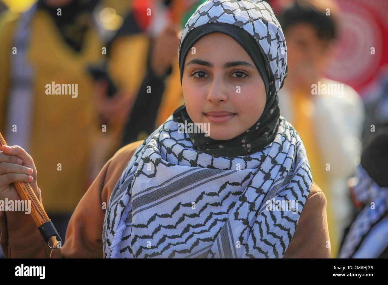 Palestinians attend a rally marking the 58th anniversary of the Fatah ...