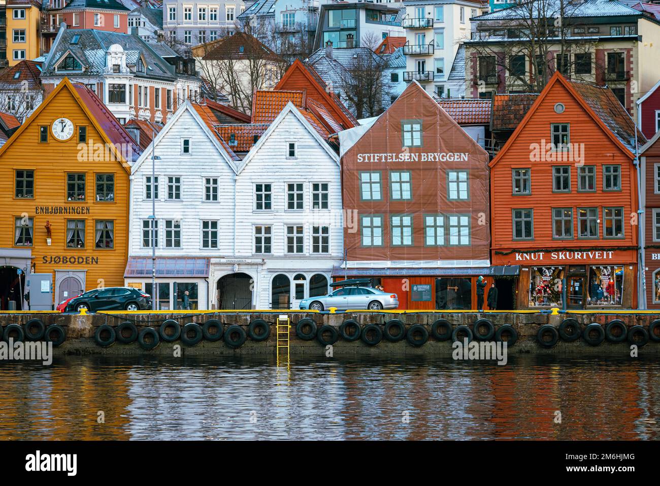 Famous Bryggen street with historical wooden colored houses. Hanseatic ...