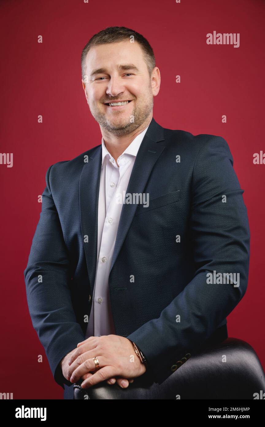 Joyful man standing smiling camera hi-res stock photography and images ...