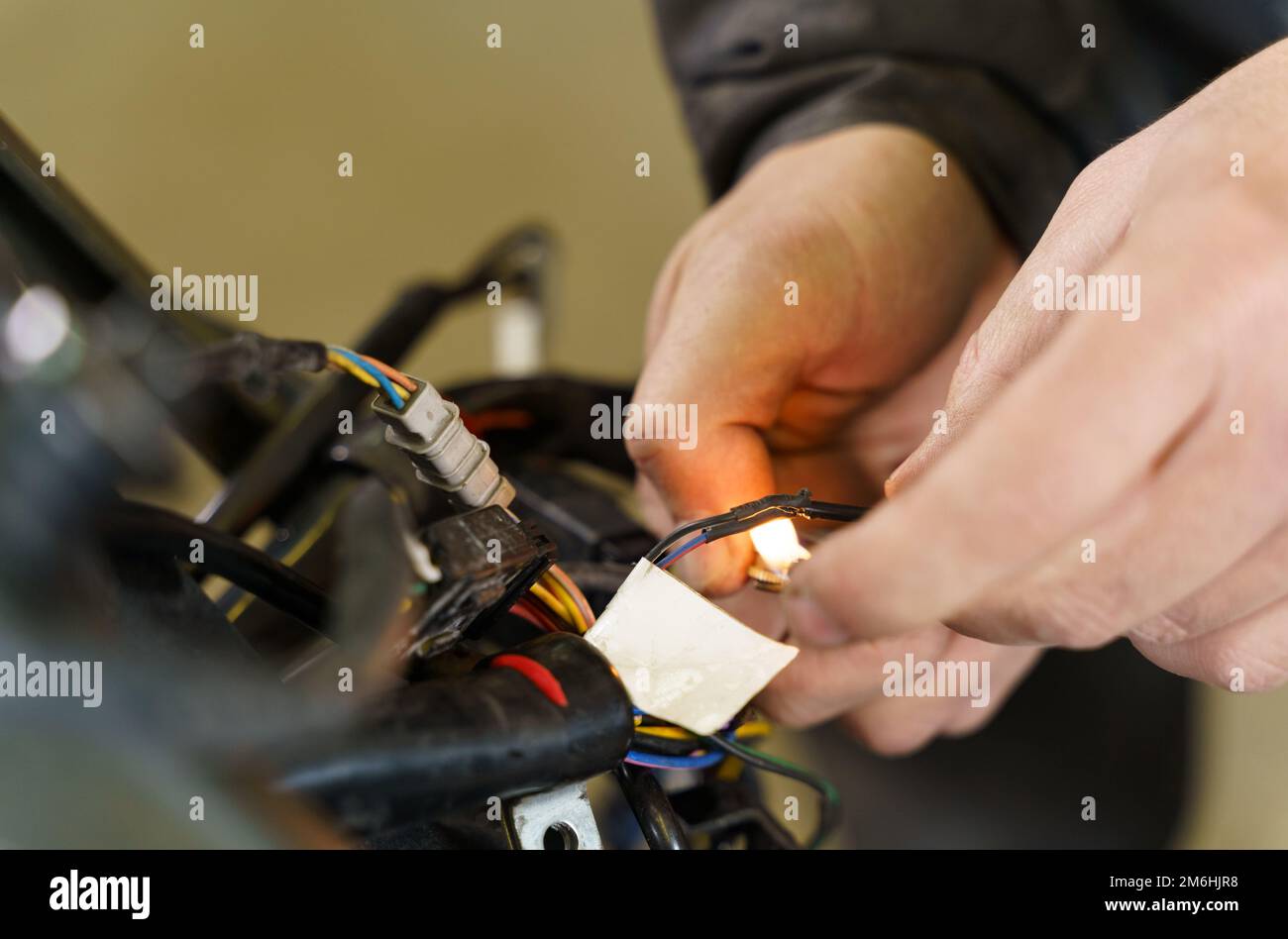 The mechanic sorts out chips for connecting electrical equipment in a ...