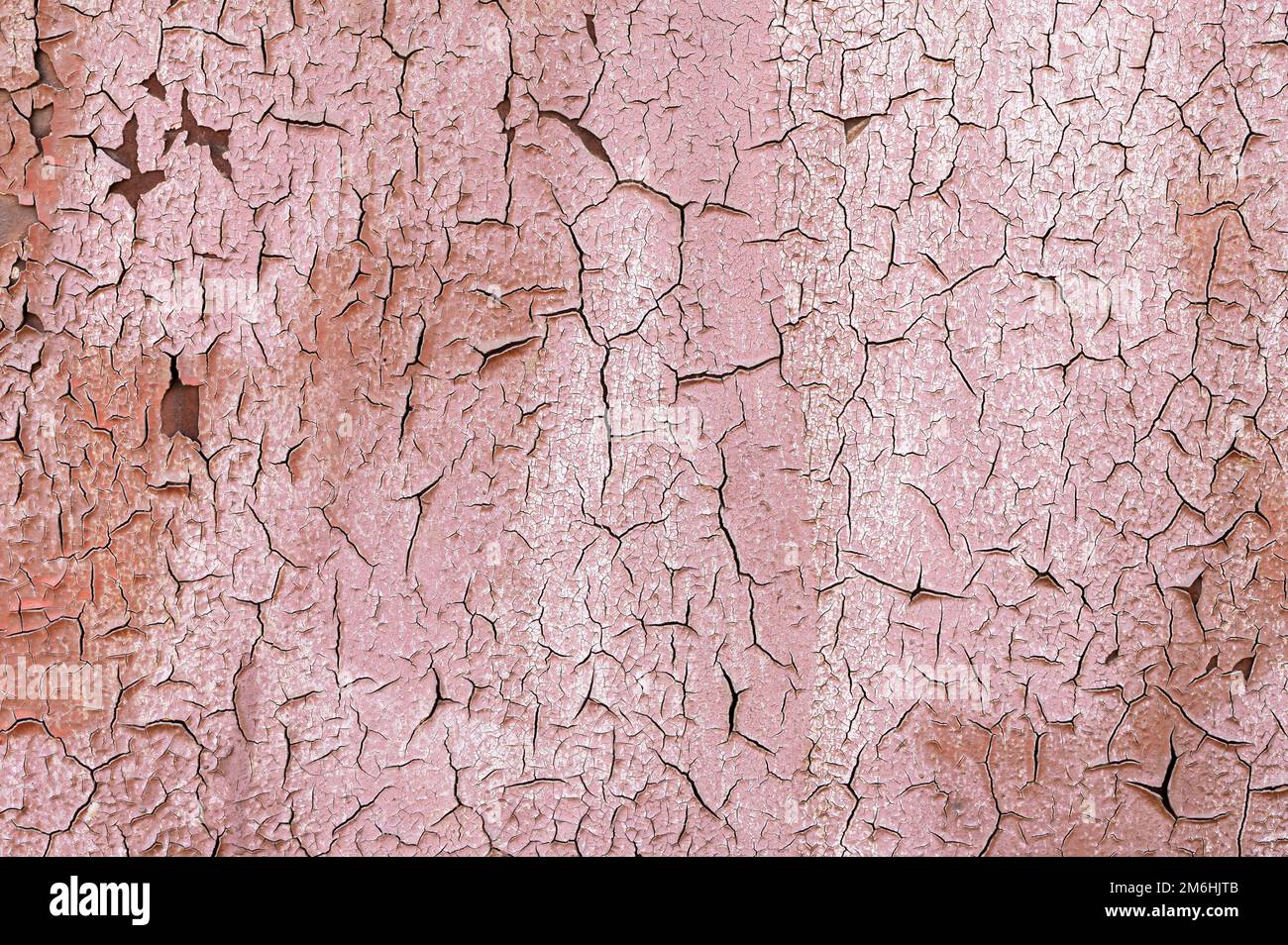 Pink Old flaky paint on a metal surface. Red grunge texture Stock Photo - Alamy