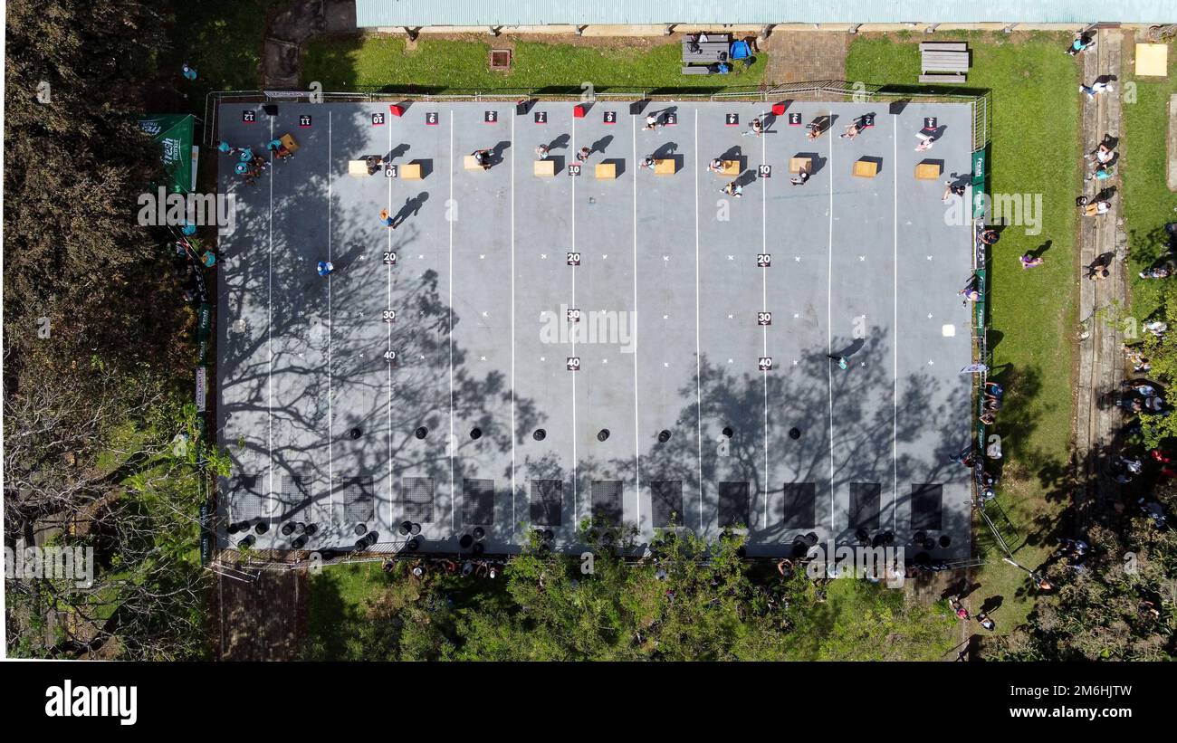 An aerial view of group of people at an outdoor fitness and endurance ...