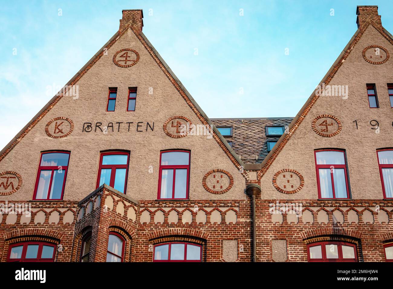 Famous Bryggen street with historical wooden colored houses. Hanseatic ...