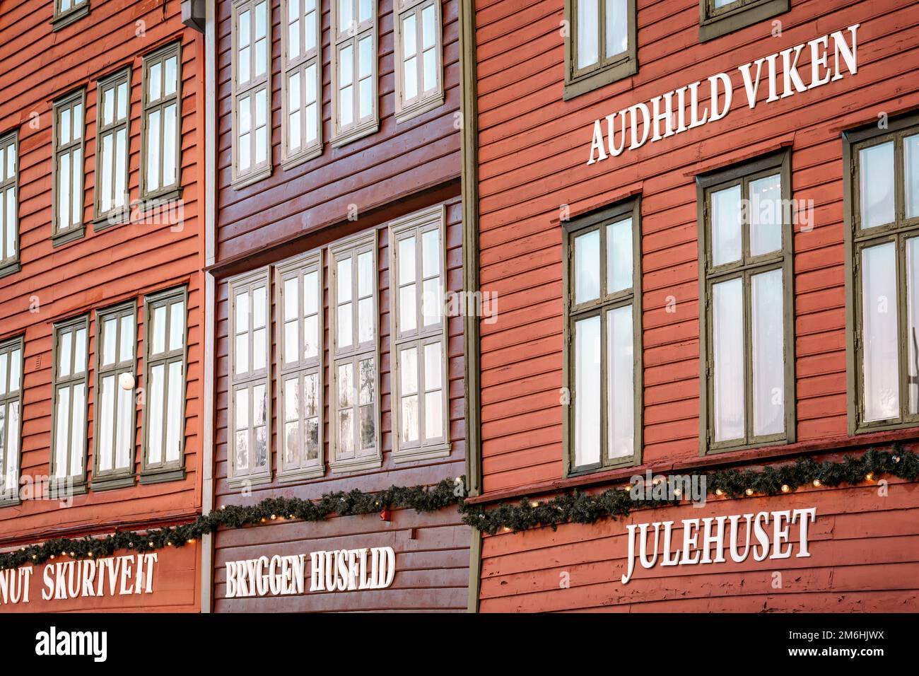 Famous Bryggen street with historical wooden colored houses. Hanseatic ...