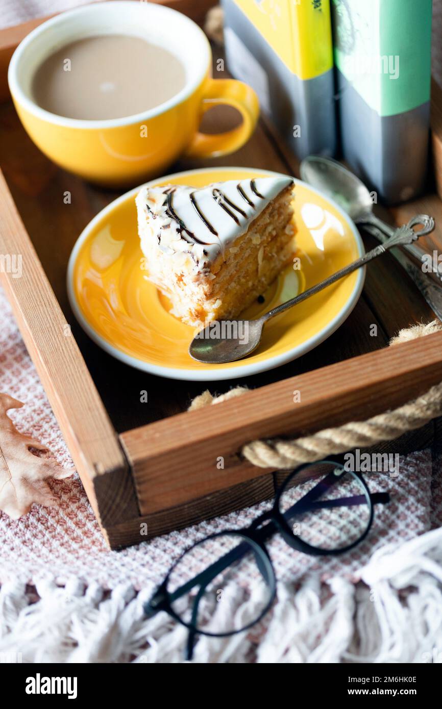 still life - cake and yellow cup with coffee Stock Photo - Alamy