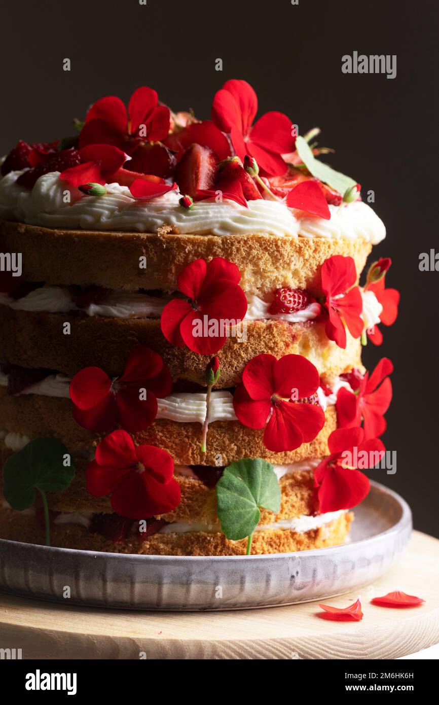 beautiful biscuit cake with strawberries decorated with natural ...