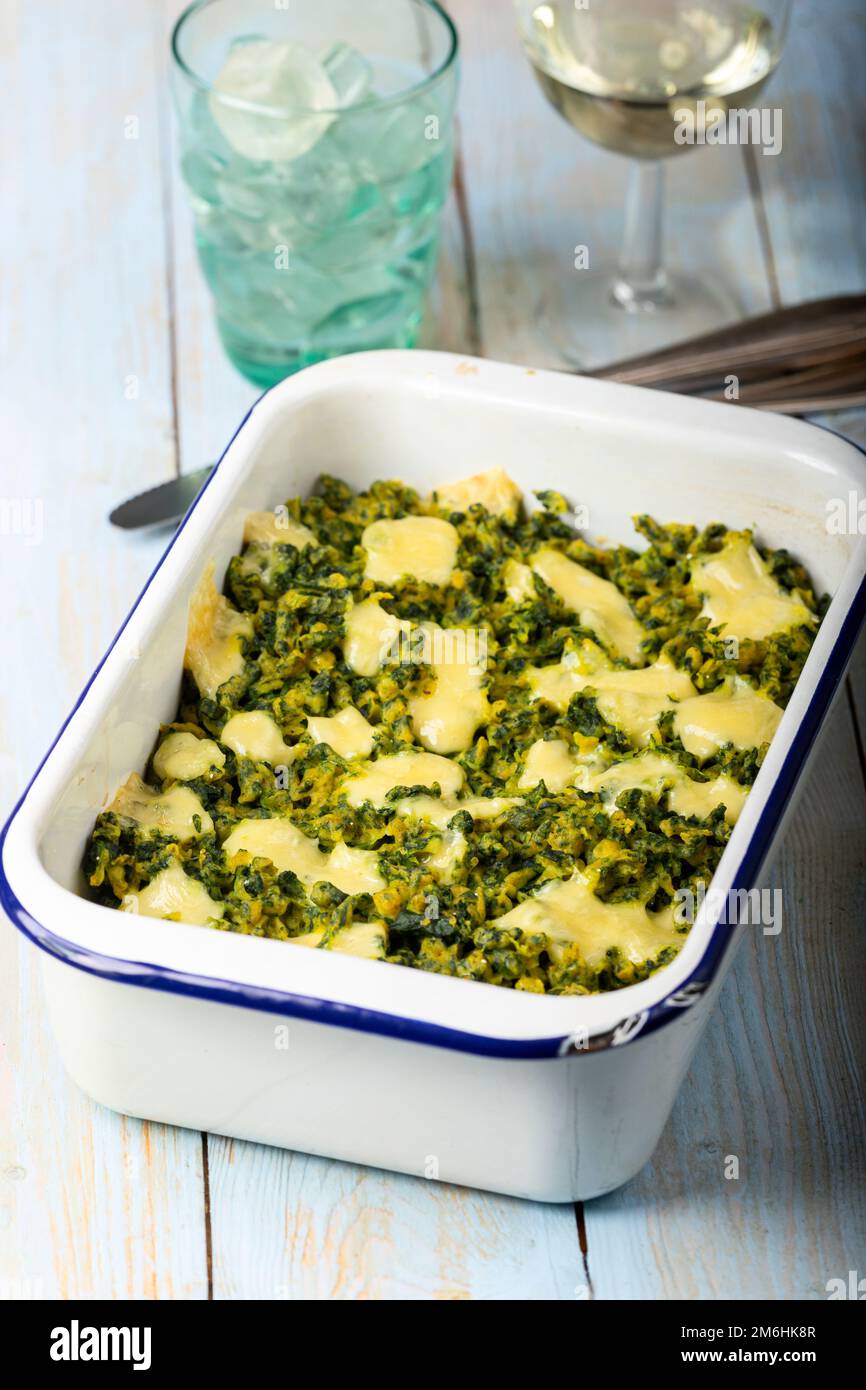 Bavarian spinach spaetzle in the casserole dish Stock Photo - Alamy