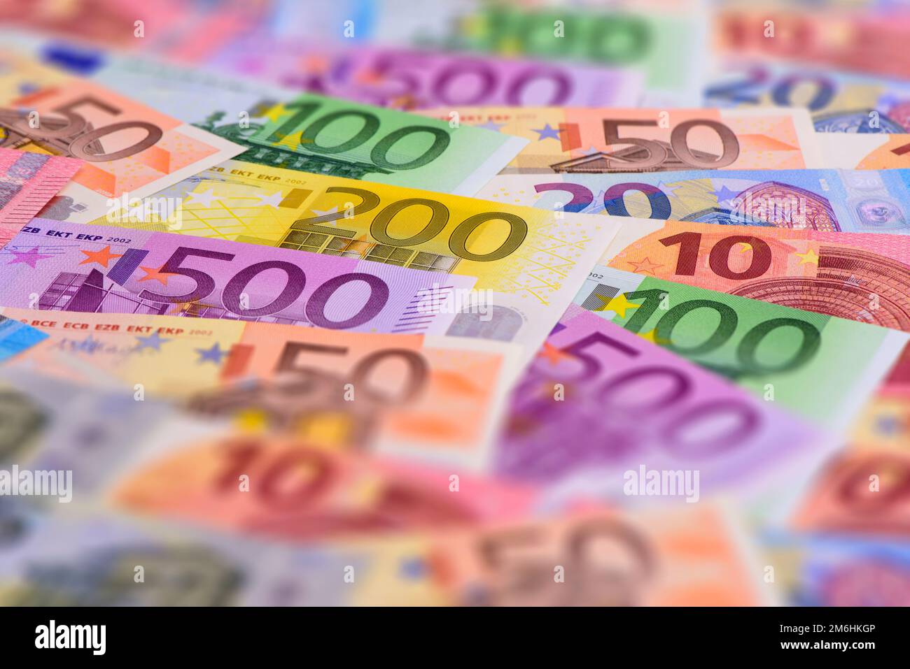 Many euro banknotes as capital Stock Photo - Alamy