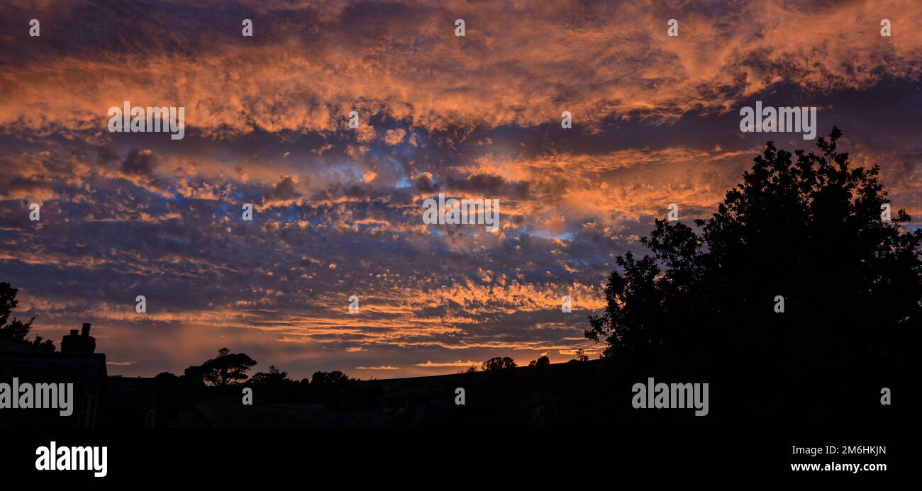 Clouds colours orange pink red sunset trees hi-res stock photography ...