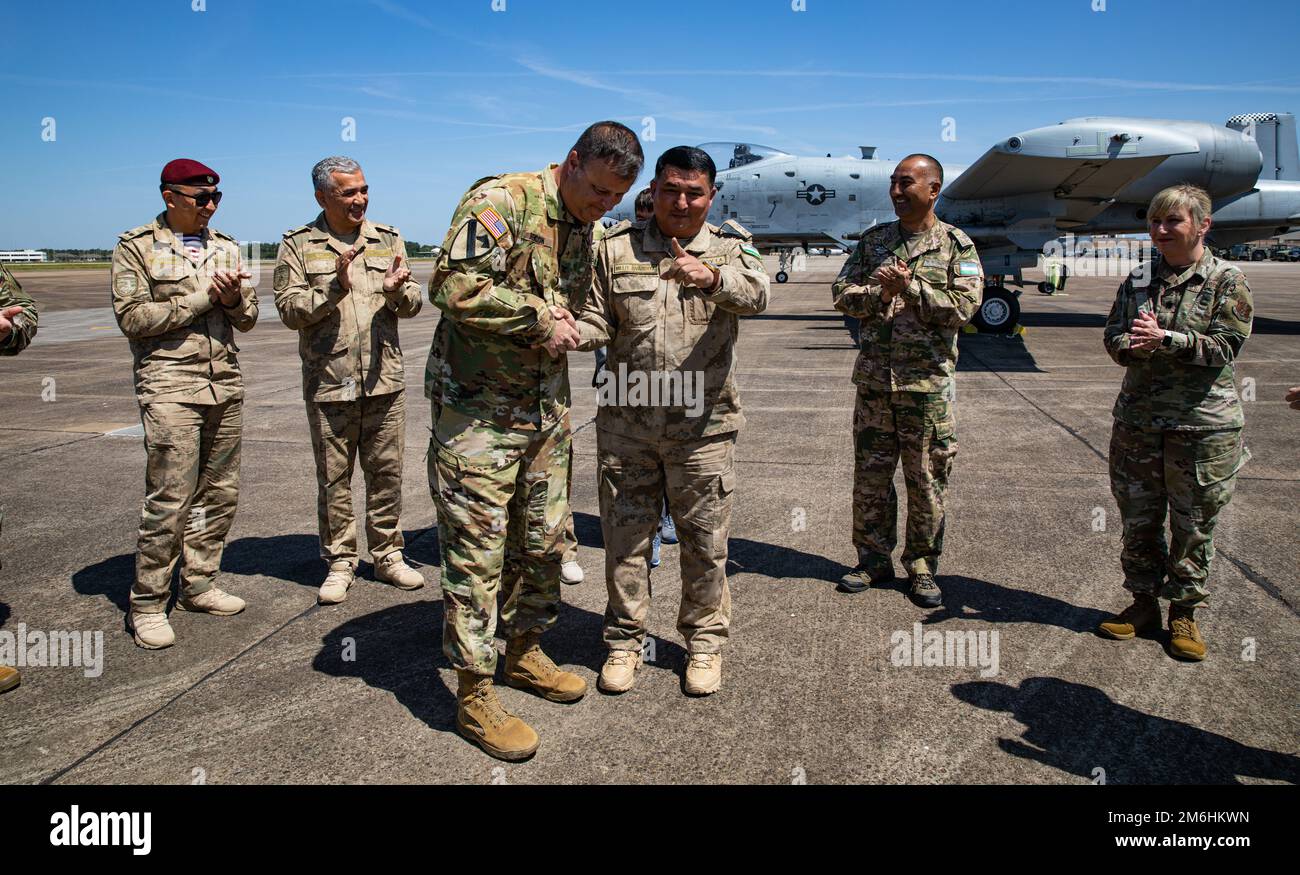 U.S. Army Col. Andrew S. Rendon, director of the exercise, meets with ...