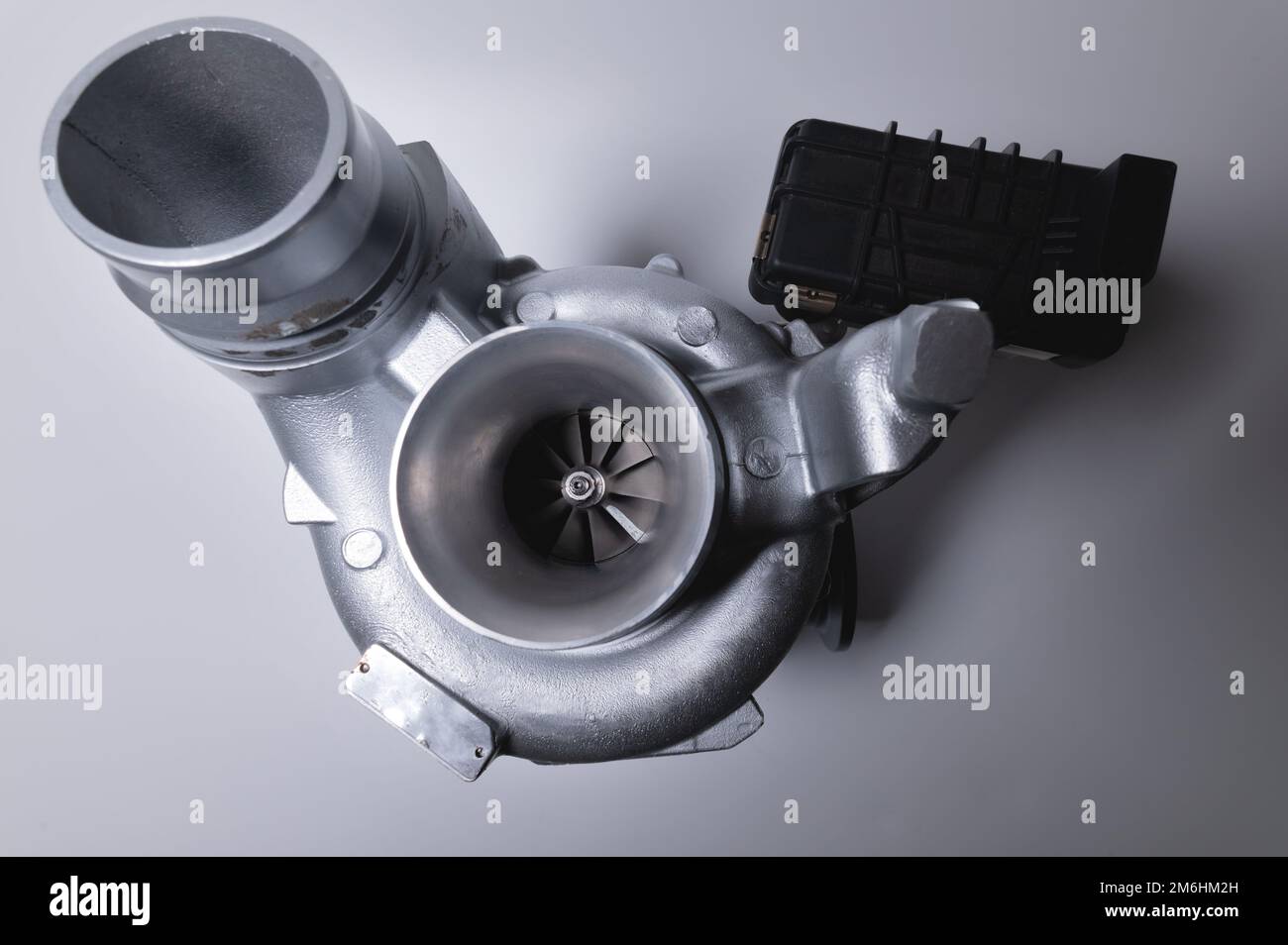 New car turbine on a gray background. Blower for air intake system ...