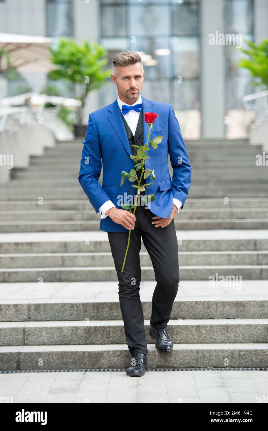 romantic man in tuxedo. man wearing tuxedo bowtie outdoor. handsome ...
