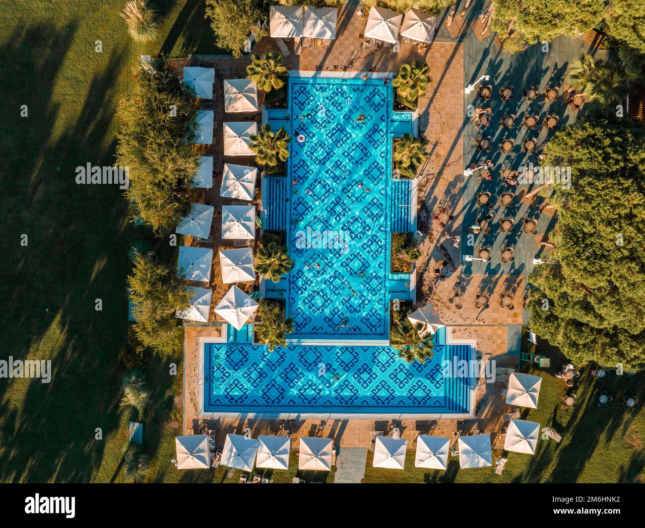 Aerial view of the outdoor swimming pool in a luxury hotel Stock Photo ...