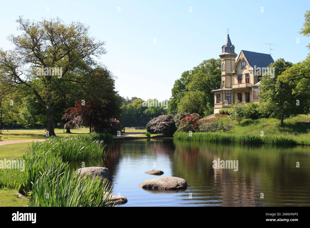 A beautiful park in the summer of 2018 in Sweden, green garss and ...