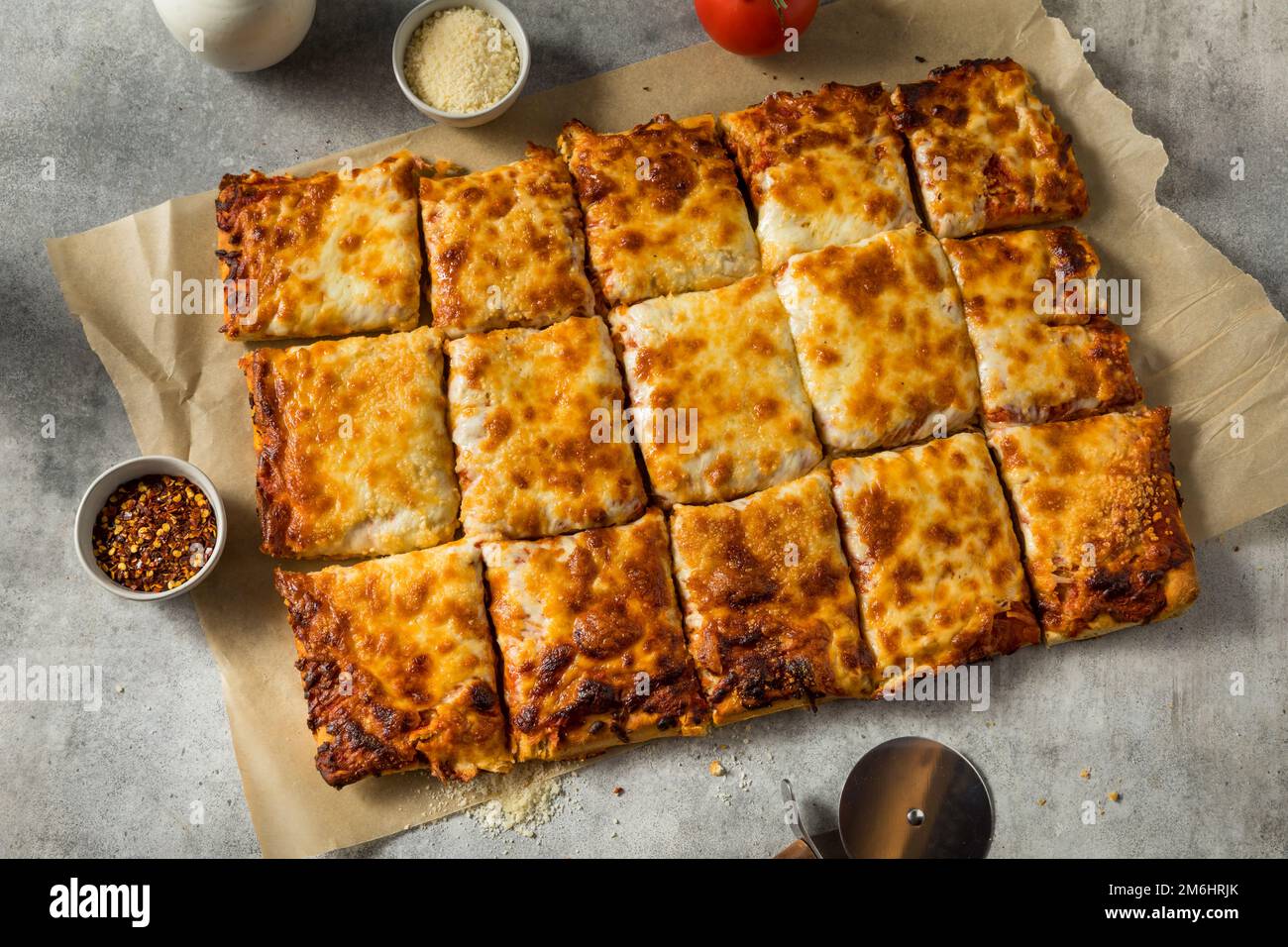 Homemade Grandma Cheese Pizza Pie with Tomato Sauce Stock Photo - Alamy