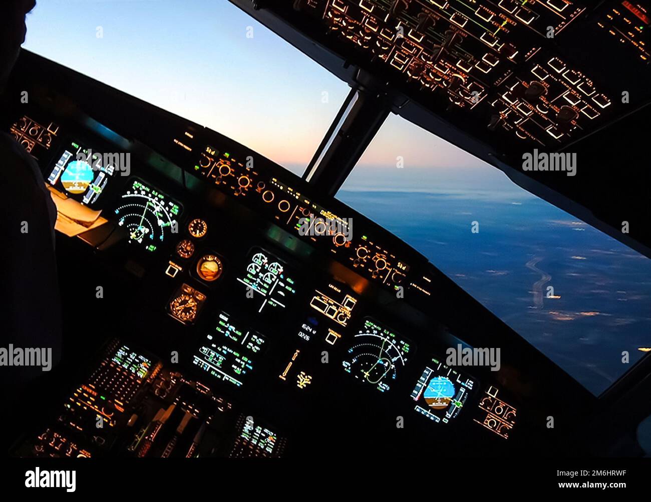 Cockpit of a passenger plane. View from the cockpit during Stock Photo ...