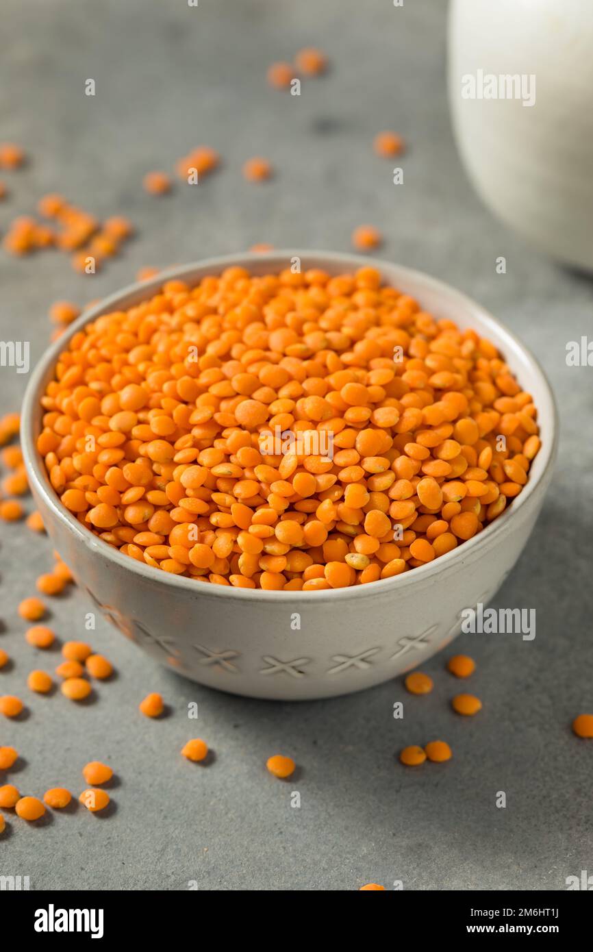 Raw Organic Red Lentils Legume in a Bowl Stock Photo - Alamy