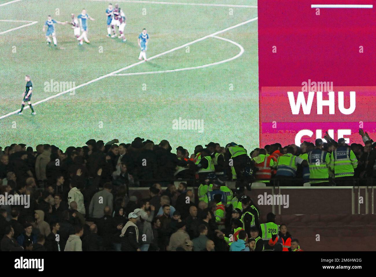 Fans clash with Police and stewards in the closing stages of the match ...