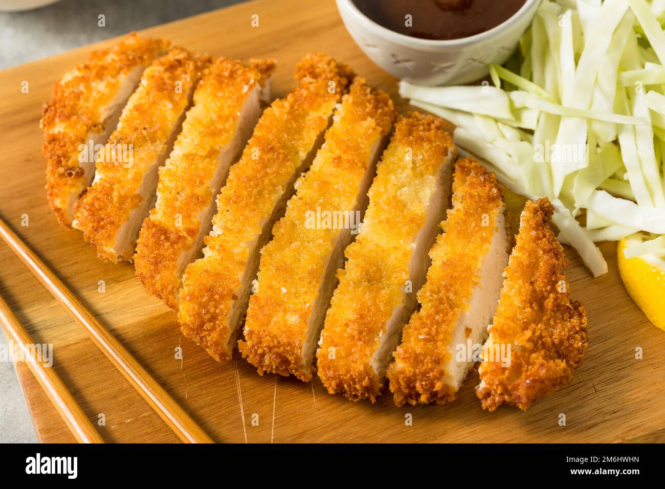 Homemade Japanese Chicken Tonkatsu with Cabbage and Lemon Stock Photo ...