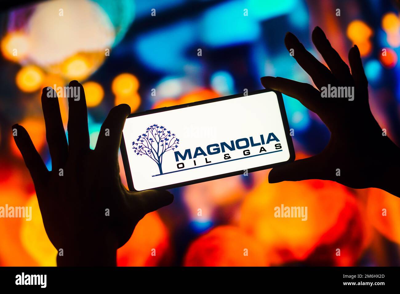 In this photo illustration, the Magnolia Oil and Gas logo is displayed ...