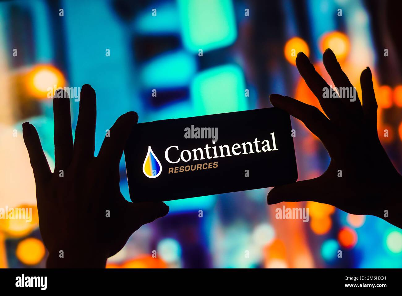 In this photo illustration, the Continental Resources logo is displayed on a smartphone screen ...