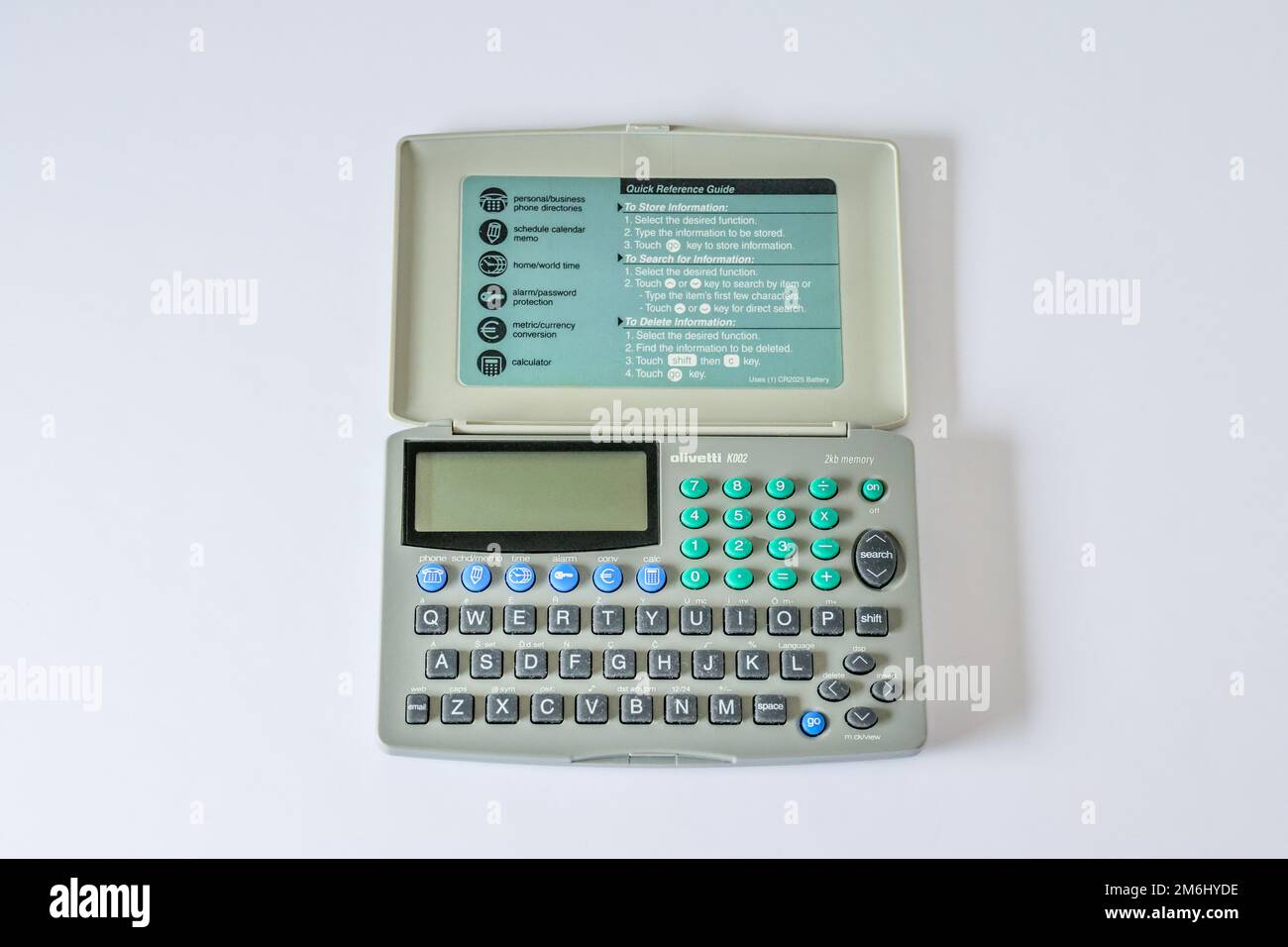 An old Personal electronic organizer Olivetti K002 over a white ...
