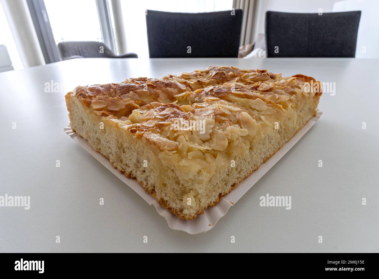 traditional North German Butterkuchen (butter cake) on dining table ...
