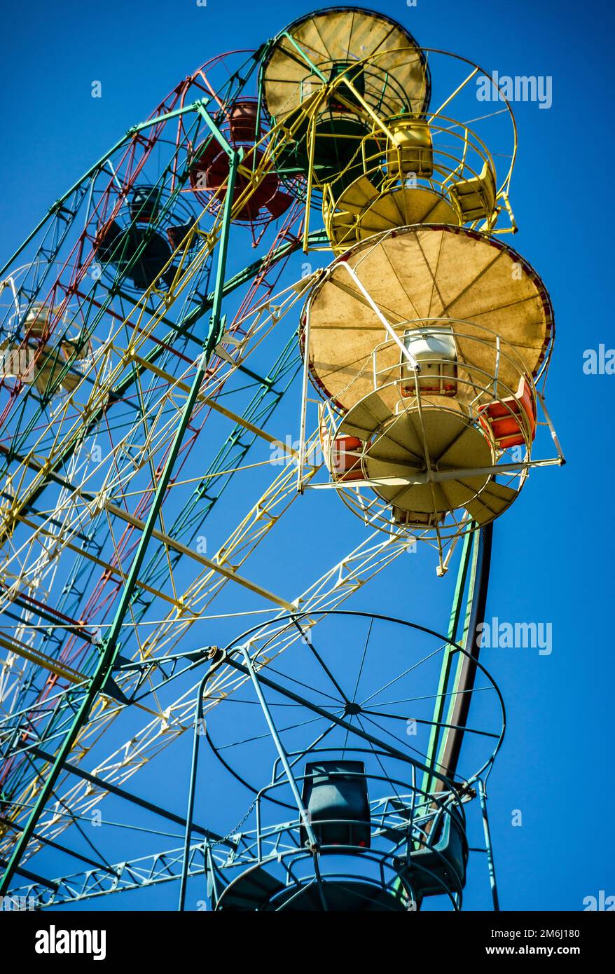Old Ferris Wheel on the blue sky background Stock Photo - Alamy