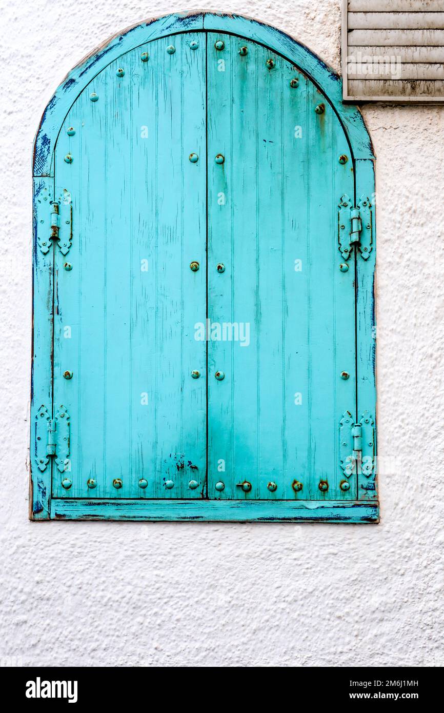 Texture of old blue wooden window in Spain Stock Photo - Alamy