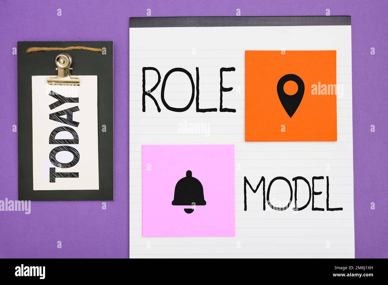 Text caption presenting Role Model. Word for a person looked to by ...