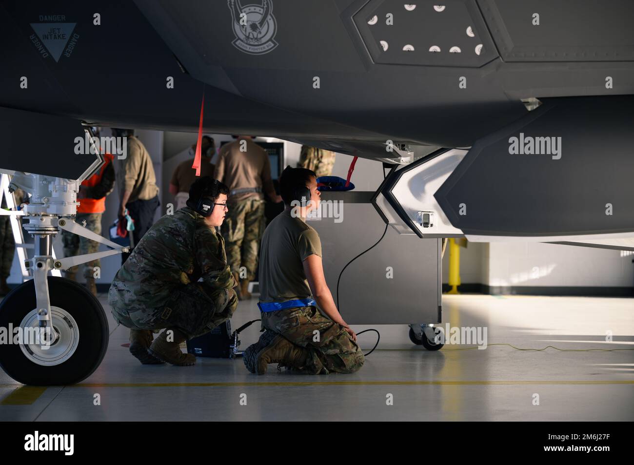 U.S. Airmen assigned to the 355th Aircraft Maintenance Unit perform a ...