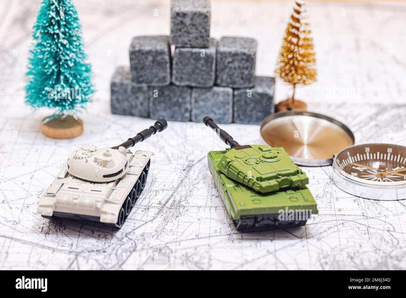 Toy models of tanks jointly attack enemy fortifications Stock Photo - Alamy
