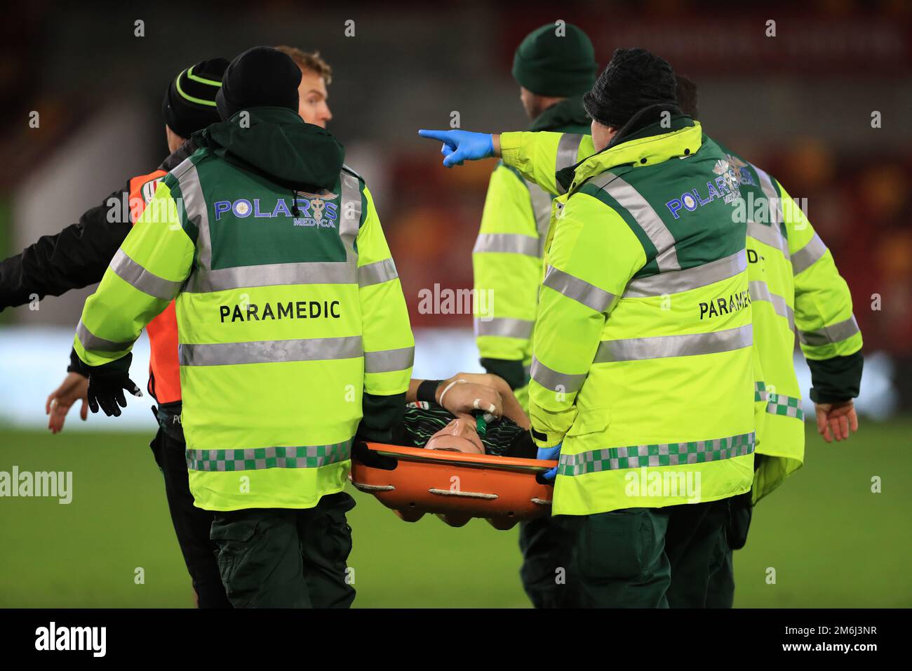 London Irish's Logan Trotter leaves on a stretcher after picking up an ...